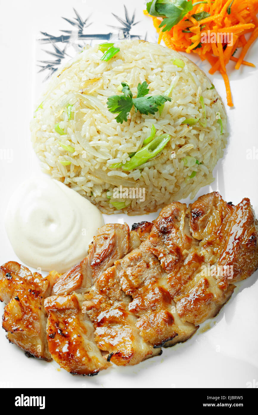 Grilled pork with rice above view Stock Photo - Alamy