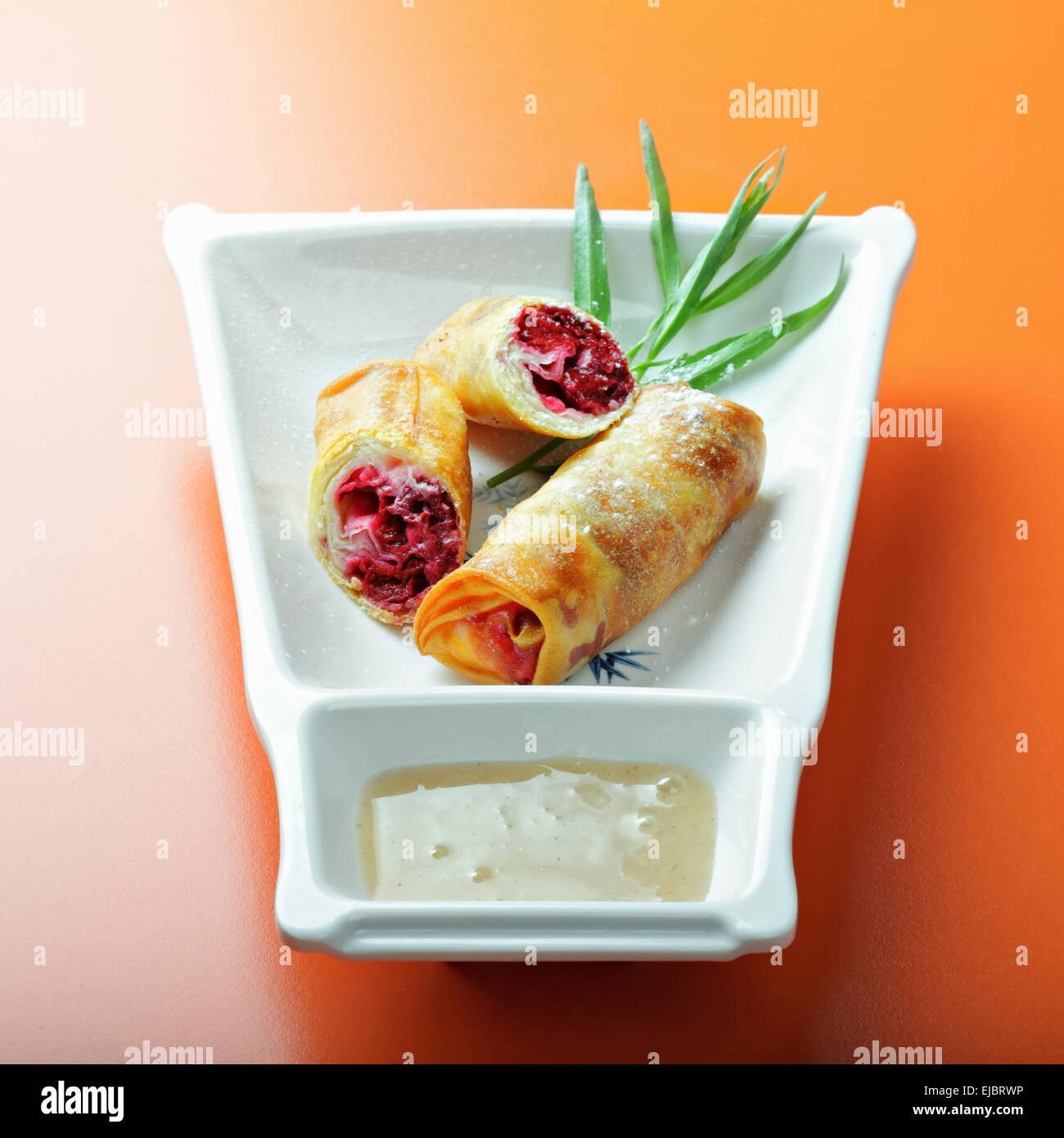 Sweet spring rolls Stock Photo - Alamy
