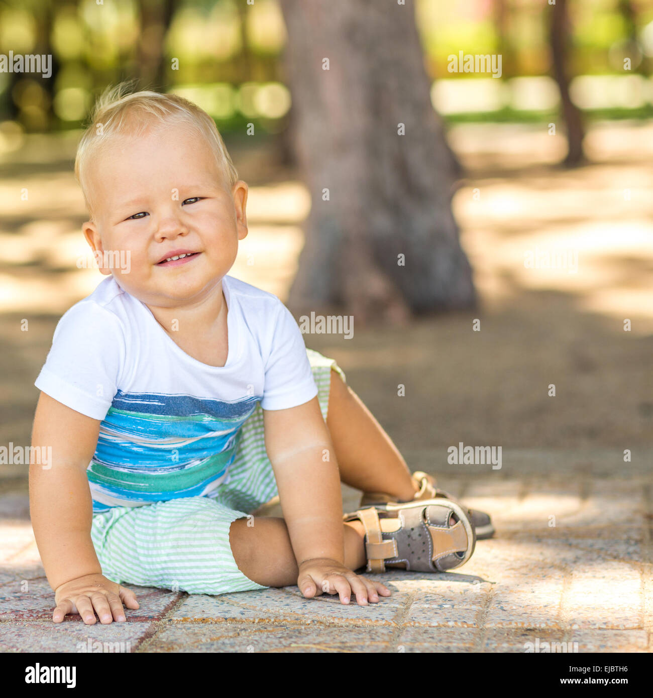 Happy emotional child sitting hi-res stock photography and images - Alamy