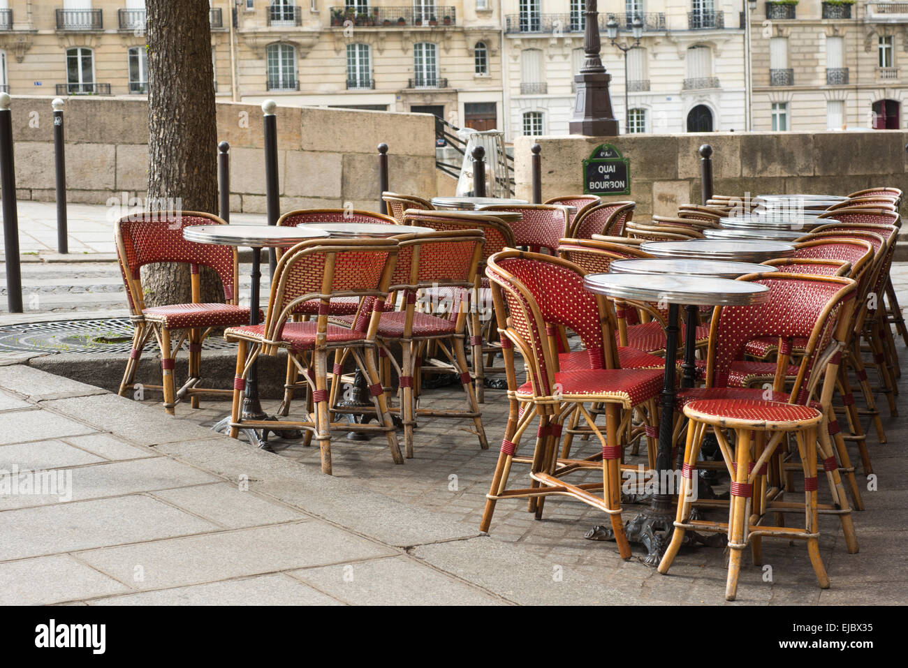Sidewalk cafe chairs in Paris, France Stock Photo - Alamy