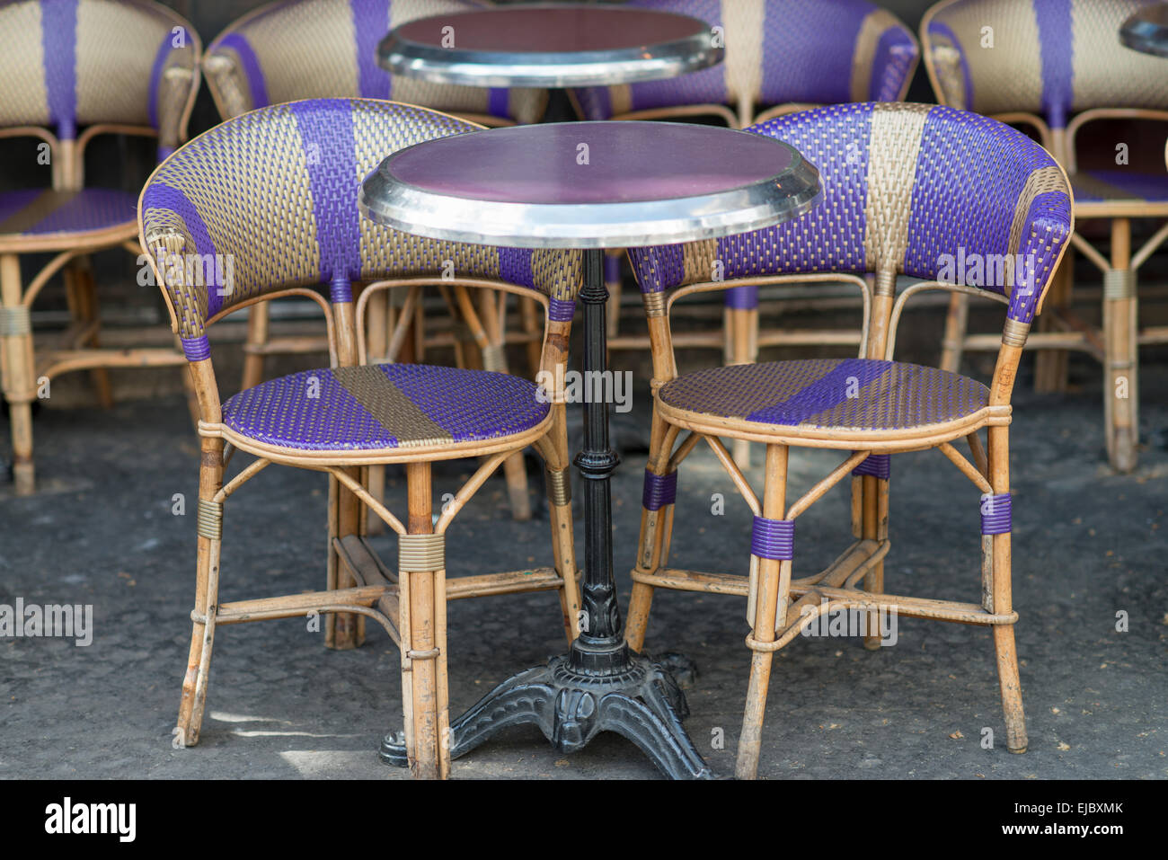 Sidewalk cafe chairs in Paris, France Stock Photo - Alamy