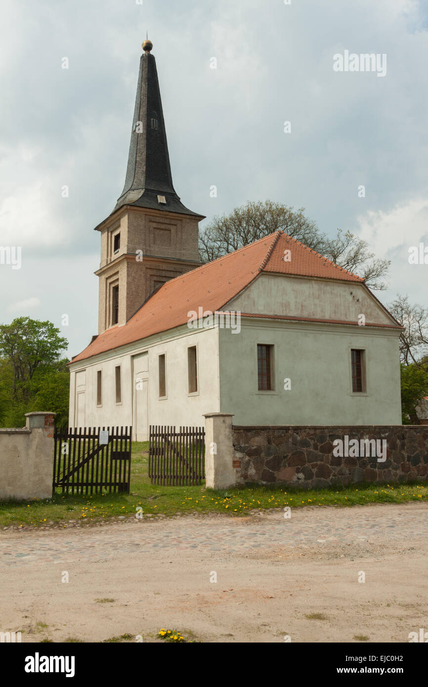 Village church and street Stock Photo - Alamy