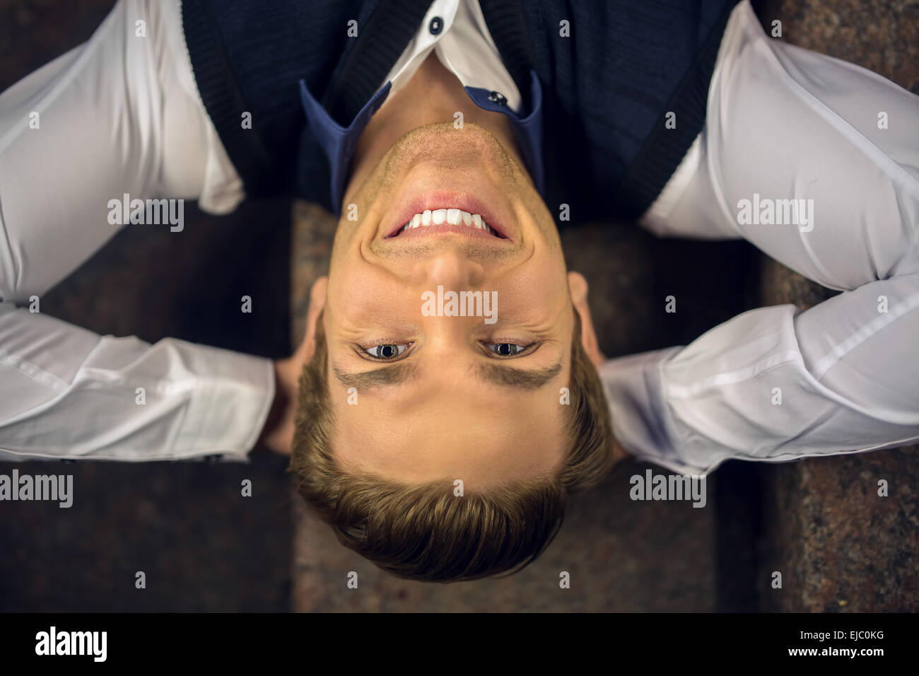 Man lying down on street hi-res stock photography and images - Alamy