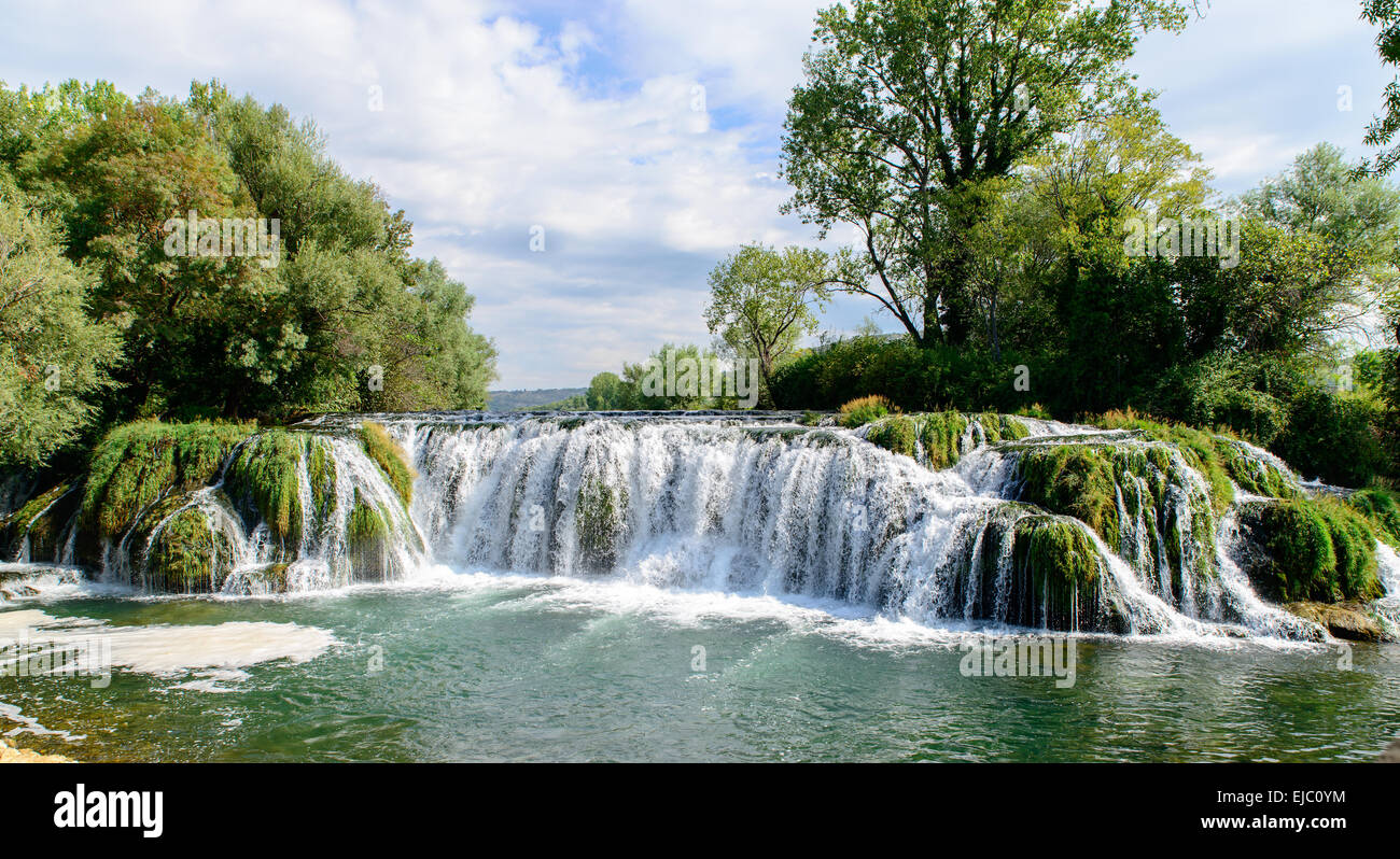 beautiful cascade water fall in the mountain Stock Photo - Alamy