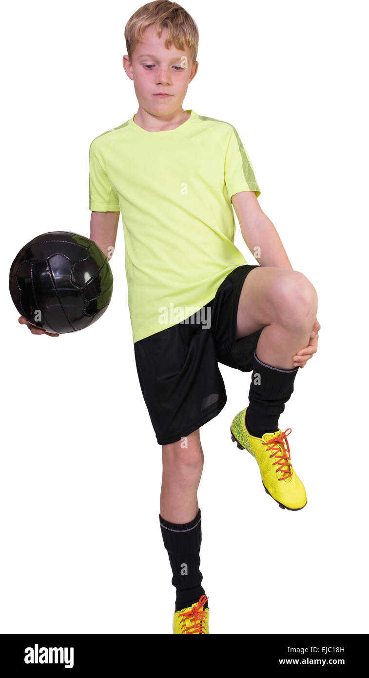 Young football player Stock Photo - Alamy