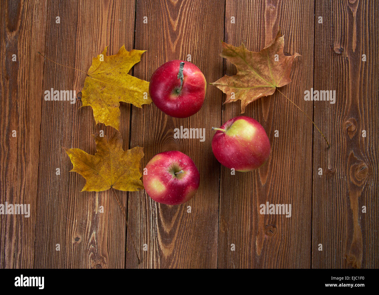 Autumn border from apples and fallen leaves Stock Photo - Alamy