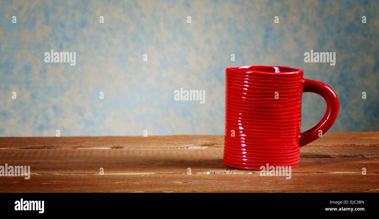 Red cup not a rural table Stock Photo - Alamy