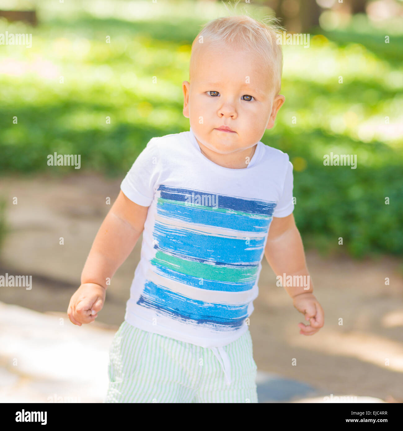 Beautiful cheerful boy walking hi-res stock photography and images - Alamy