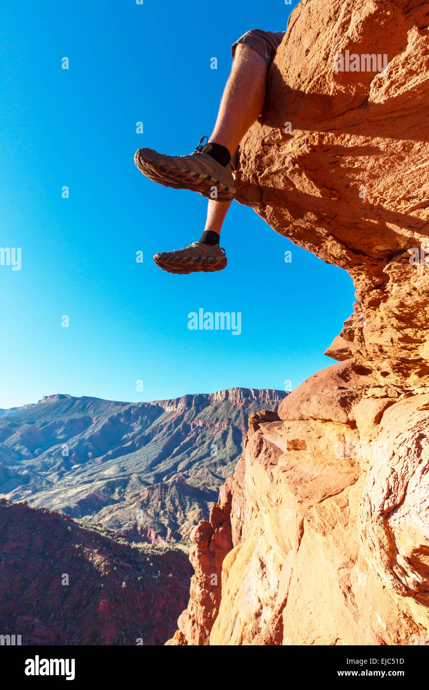 Man on the cliff Stock Photo - Alamy