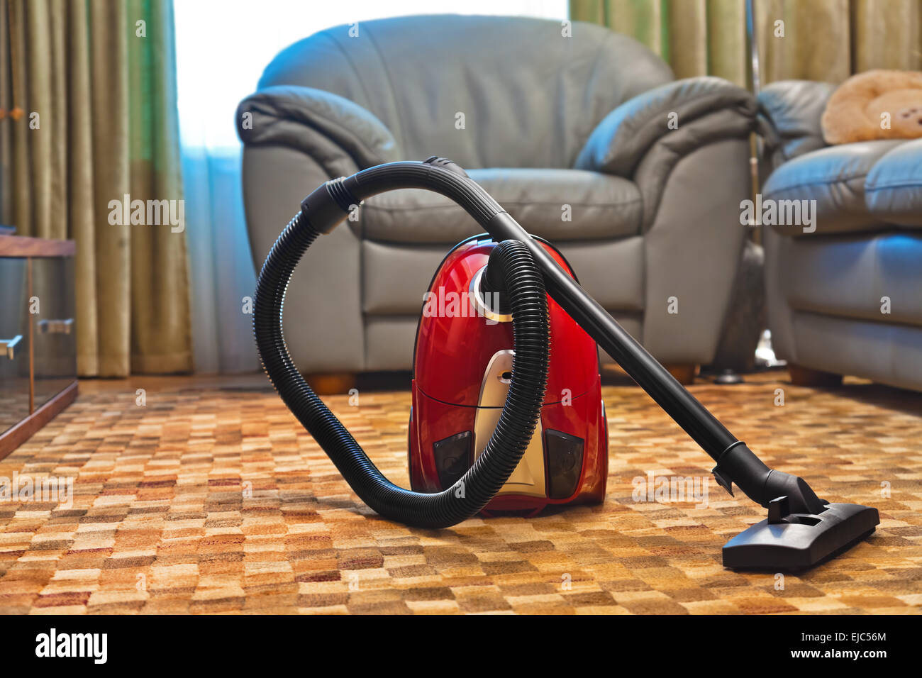Vacuum cleaner in room Stock Photo - Alamy