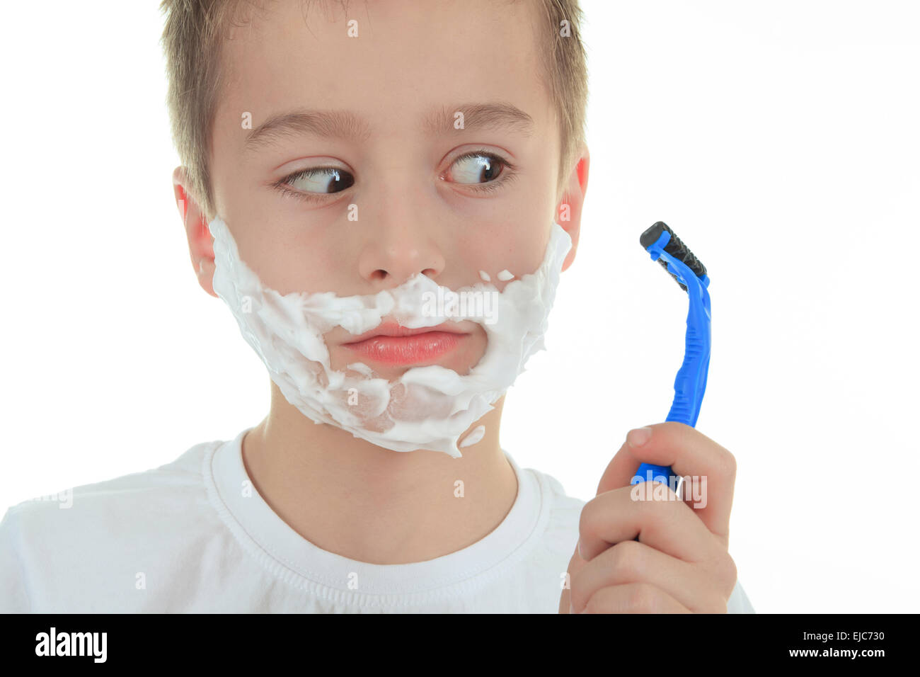 playful little young boy shaving face over white Stock Photo - Alamy