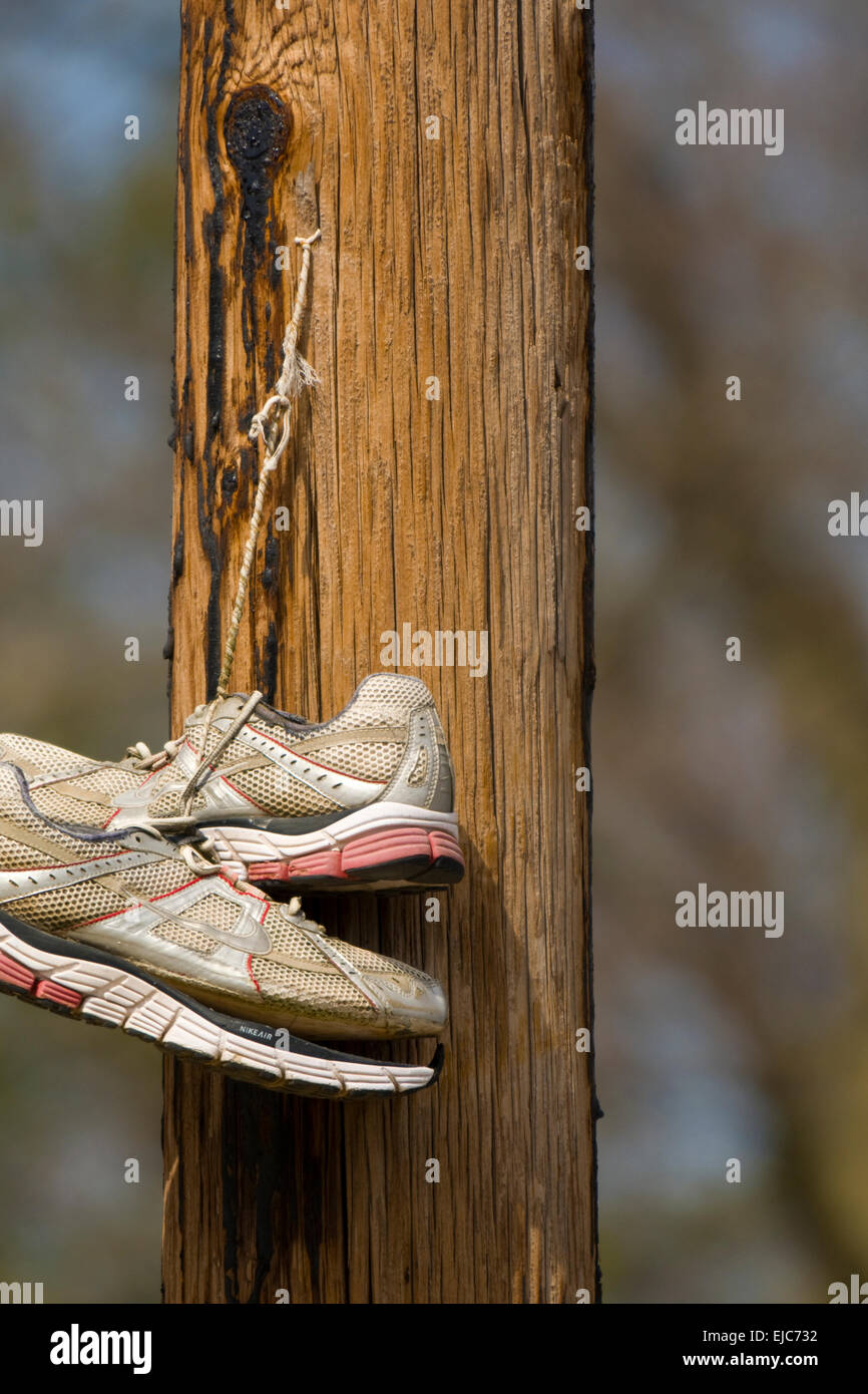 Dangling shoes High Resolution Stock Photography and Images - Alamy