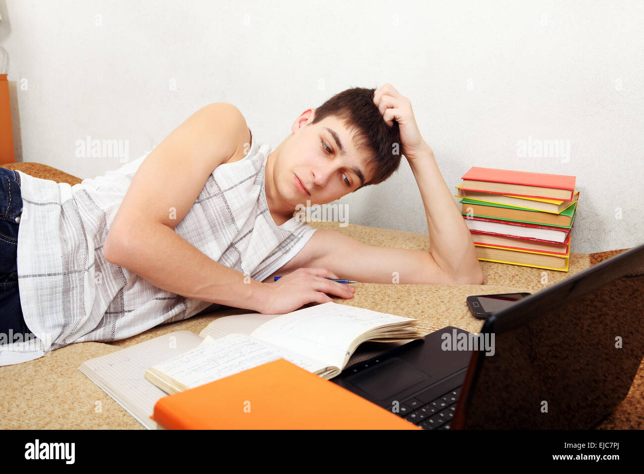Teenager doing Homework Stock Photo - Alamy