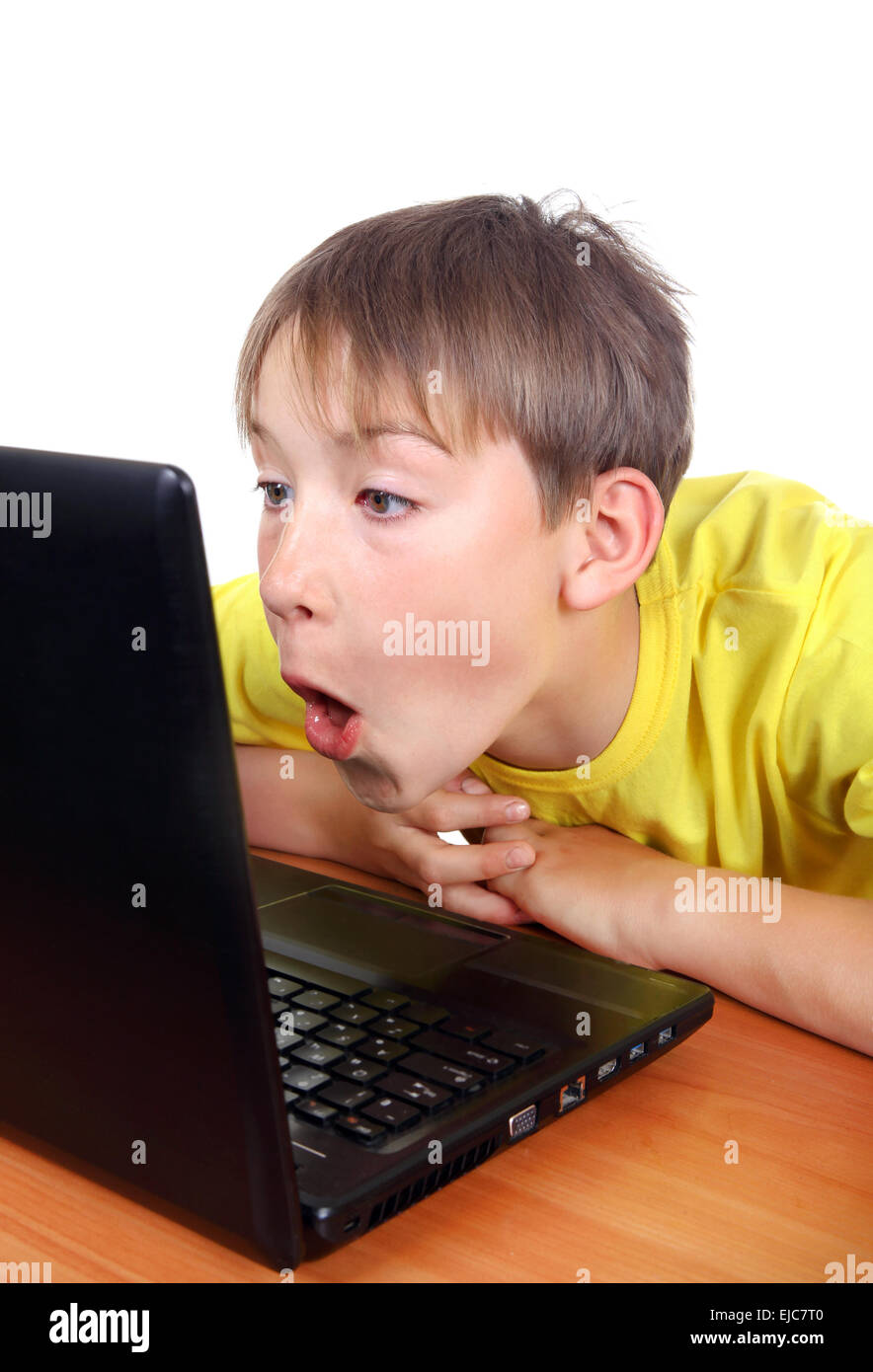 Surprised Kid with Laptop Stock Photo - Alamy