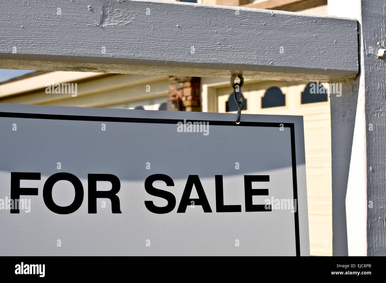 For Sale Sign with Home in Background Stock Photo - Alamy