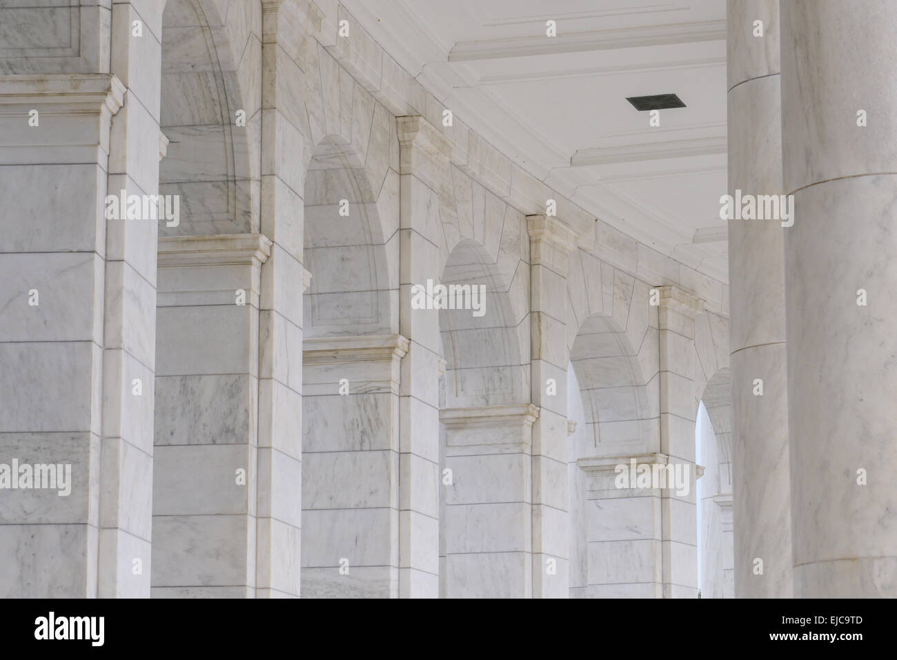 Stone Pillars with white Arches Stock Photo - Alamy