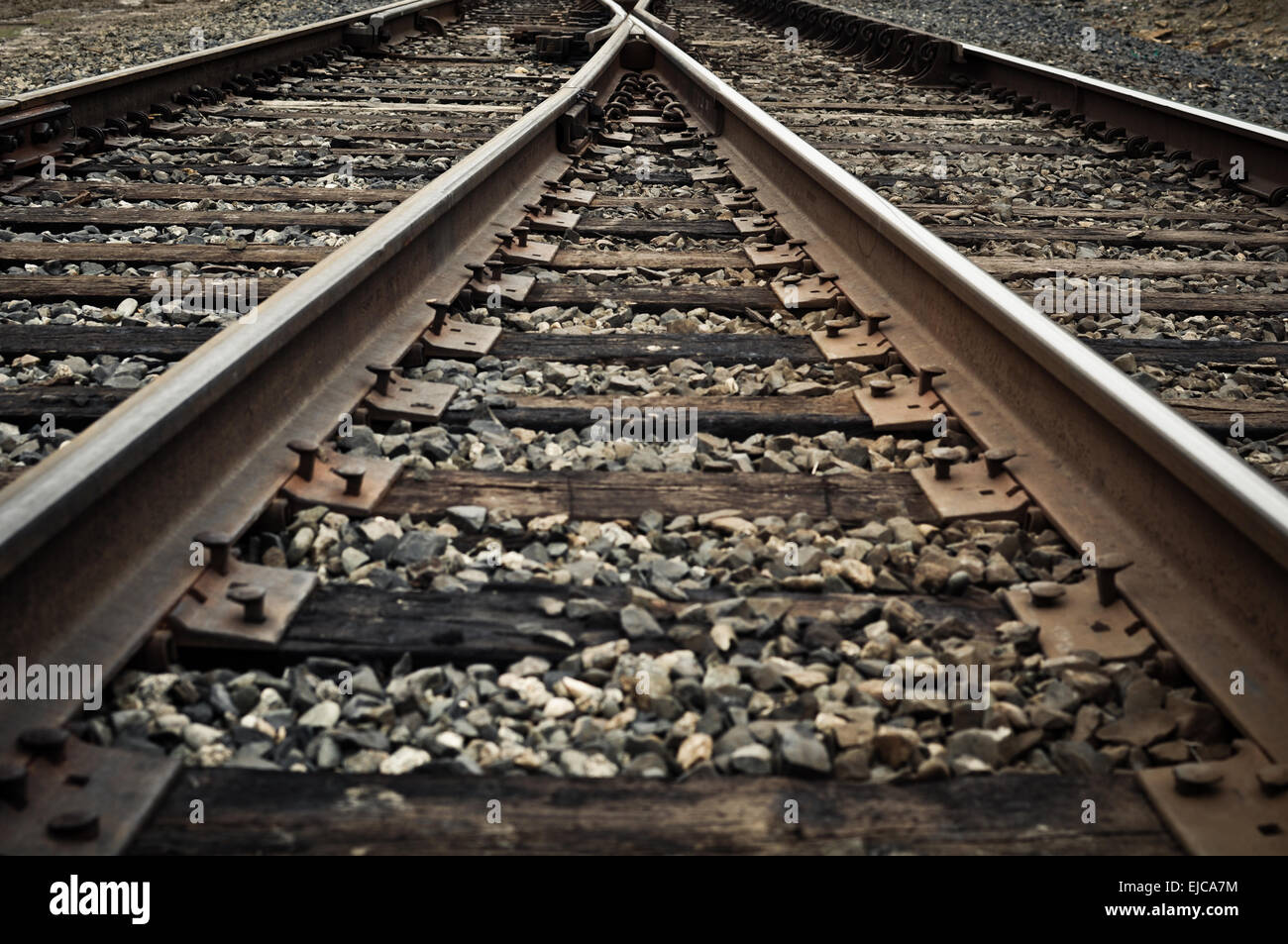 Old Rustic Railroad Track splitting lanes Stock Photo - Alamy