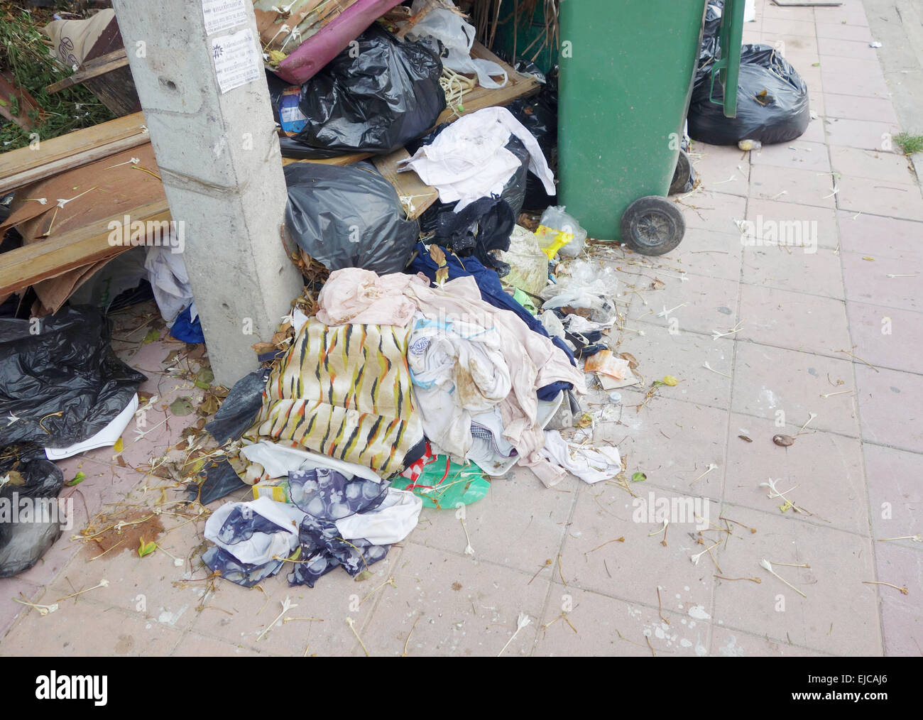 Trash clothes not waste not dump hi-res stock photography and images ...