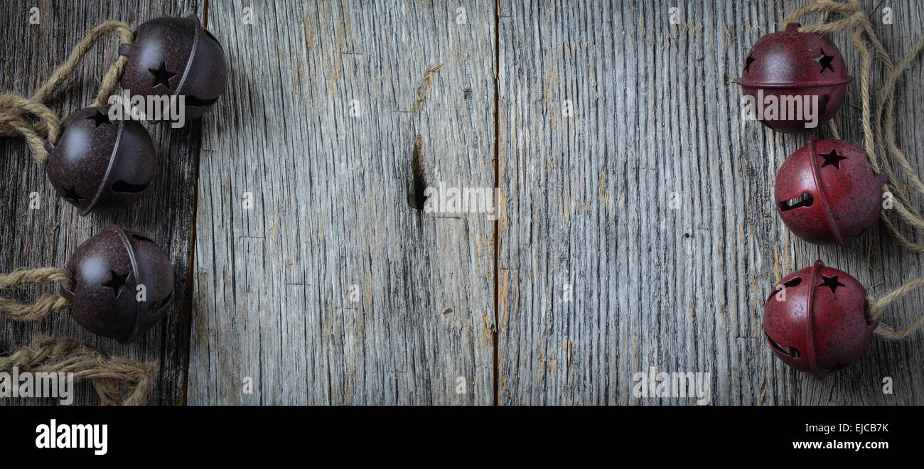Rustic Christmas Bells and Wood Background Stock Photo - Alamy