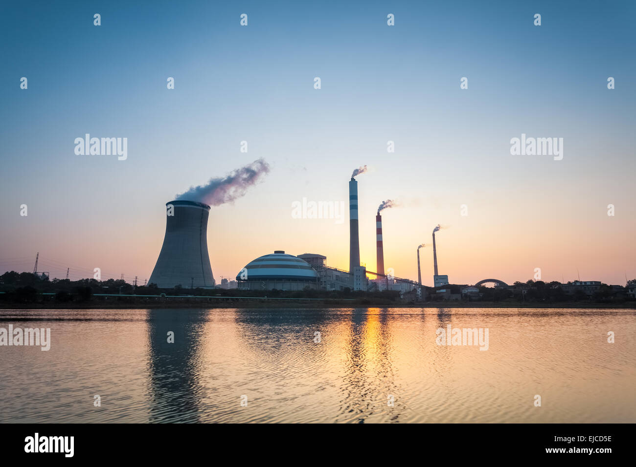 coal fired power station in sunset Stock Photo - Alamy