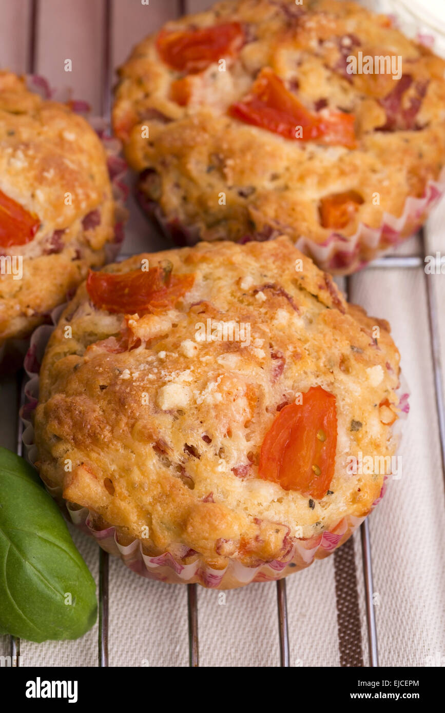 Fresh pizza muffin as a snack Stock Photo - Alamy