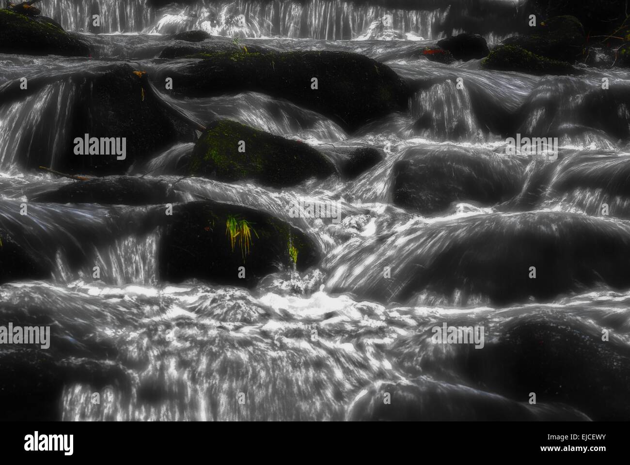 flow and movement between the rocks Stock Photo - Alamy