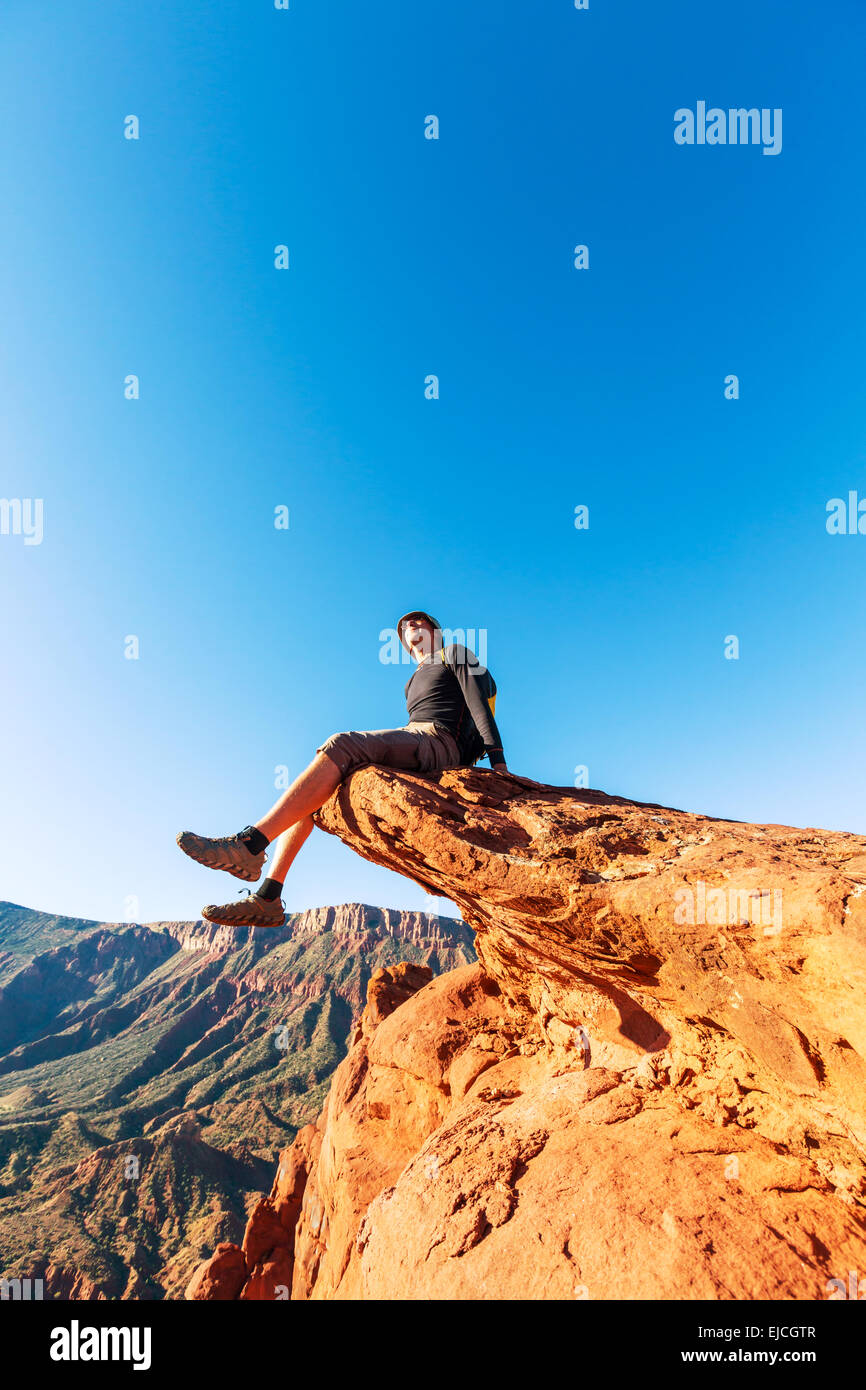 Man on the cliff Stock Photo - Alamy