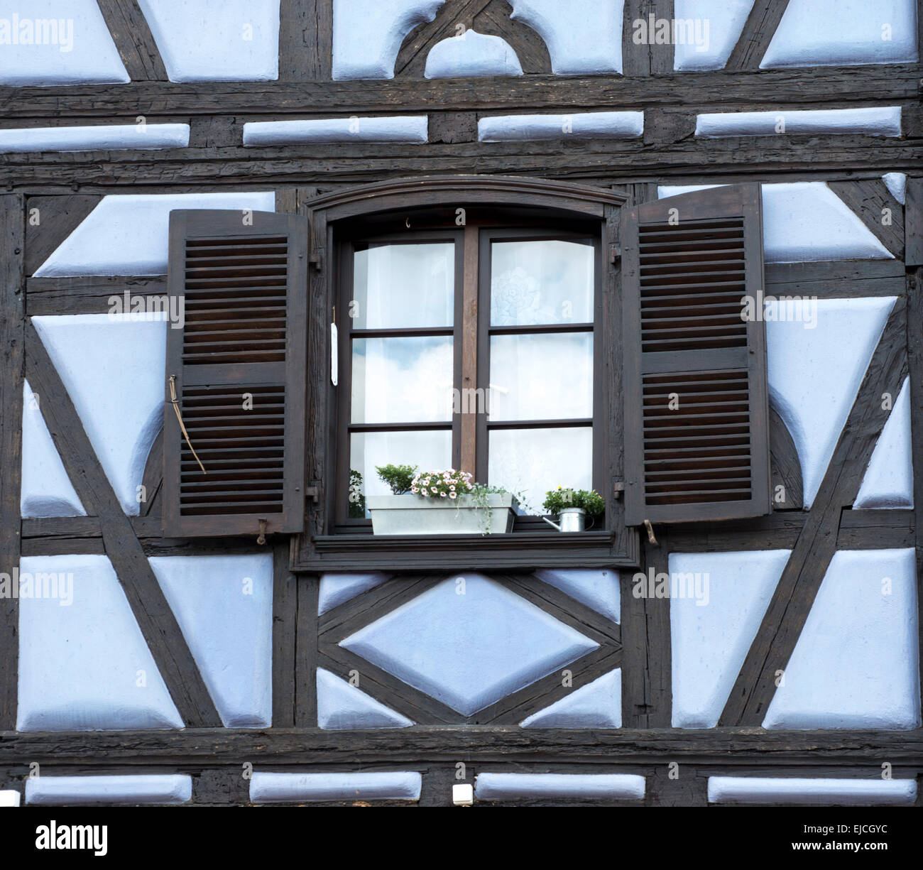 Medieval building with windows and shutters in Colmar, France Stock ...