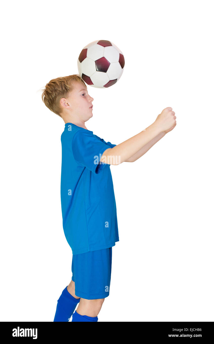 Football player makes header Stock Photo - Alamy