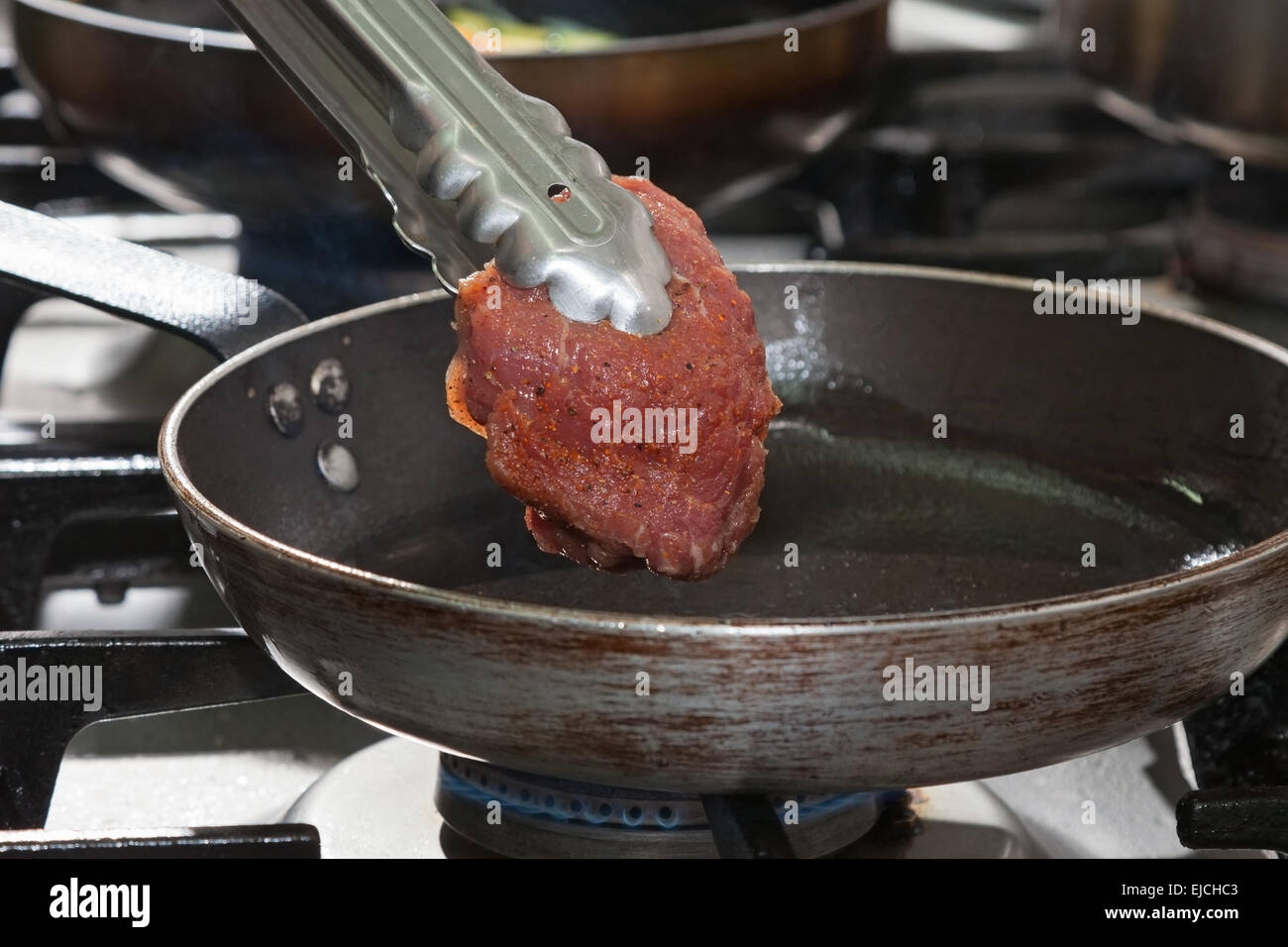 preparation and cooking of meat Stock Photo - Alamy