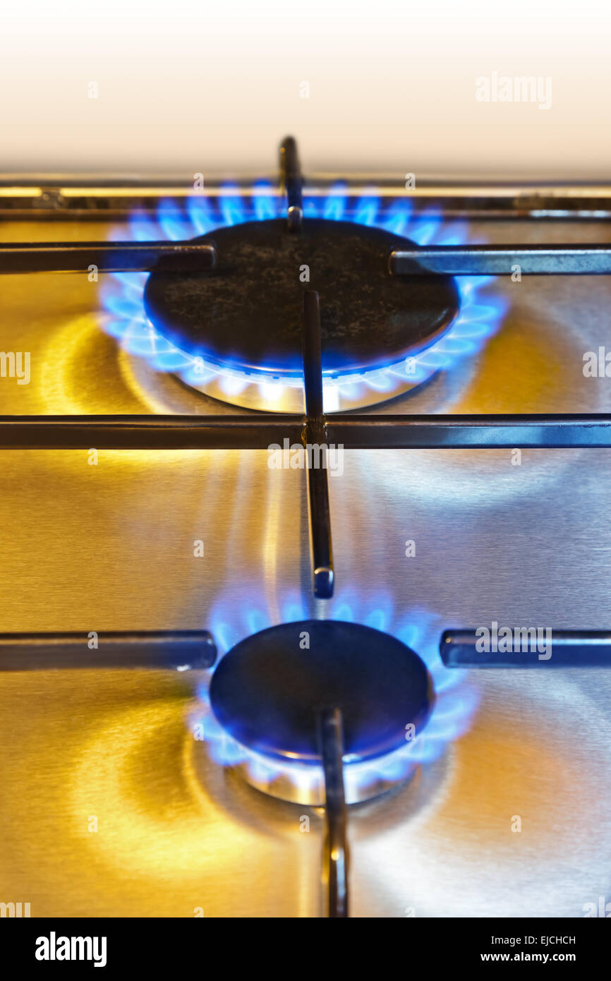 Flames of gas - kitchen stove Stock Photo - Alamy