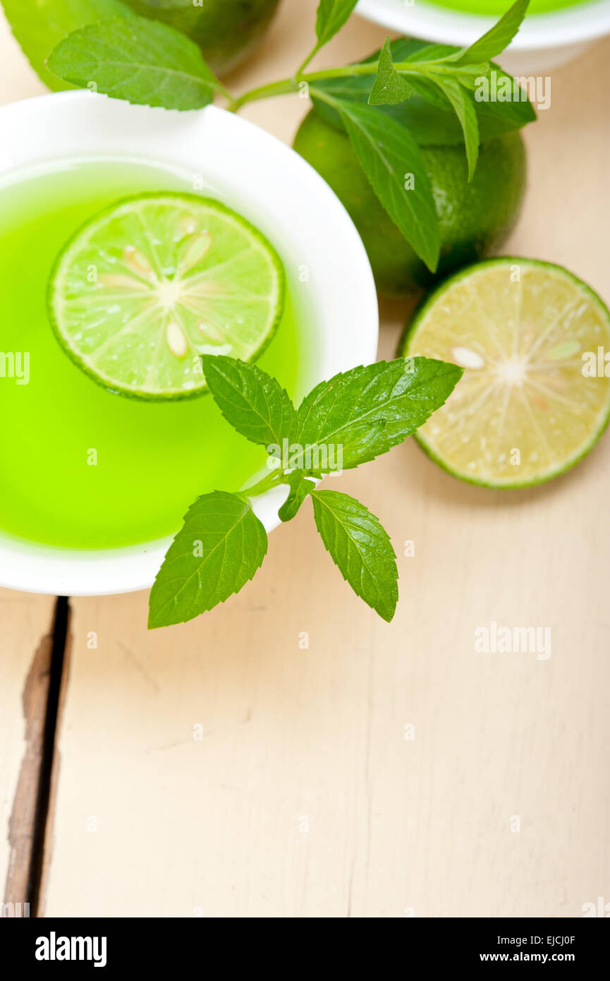 mint infusion tea tisane with lime Stock Photo - Alamy