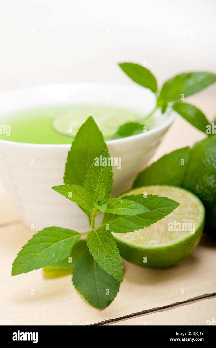 mint infusion tea tisane with lime Stock Photo - Alamy