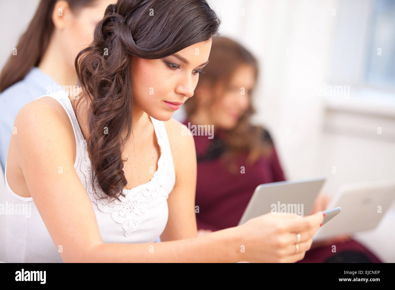 young girl reading tablet Stock Photo - Alamy