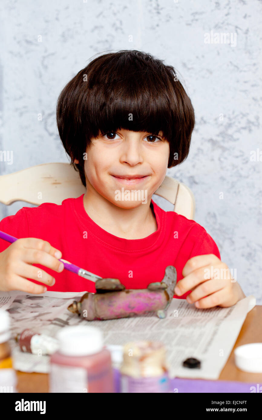 Boy paints hi-res stock photography and images - Alamy