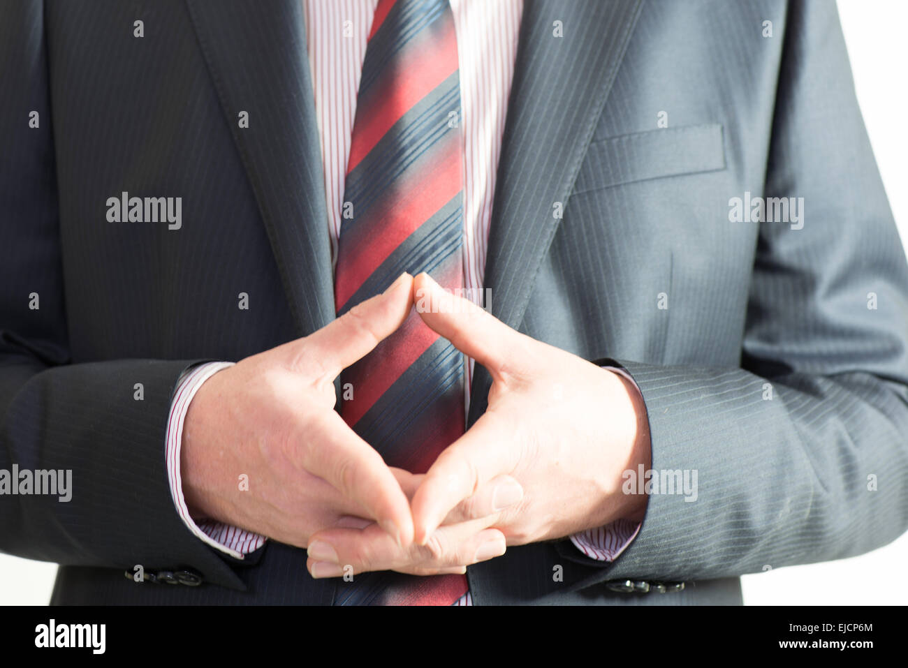 Business man making a gesture Stock Photo - Alamy