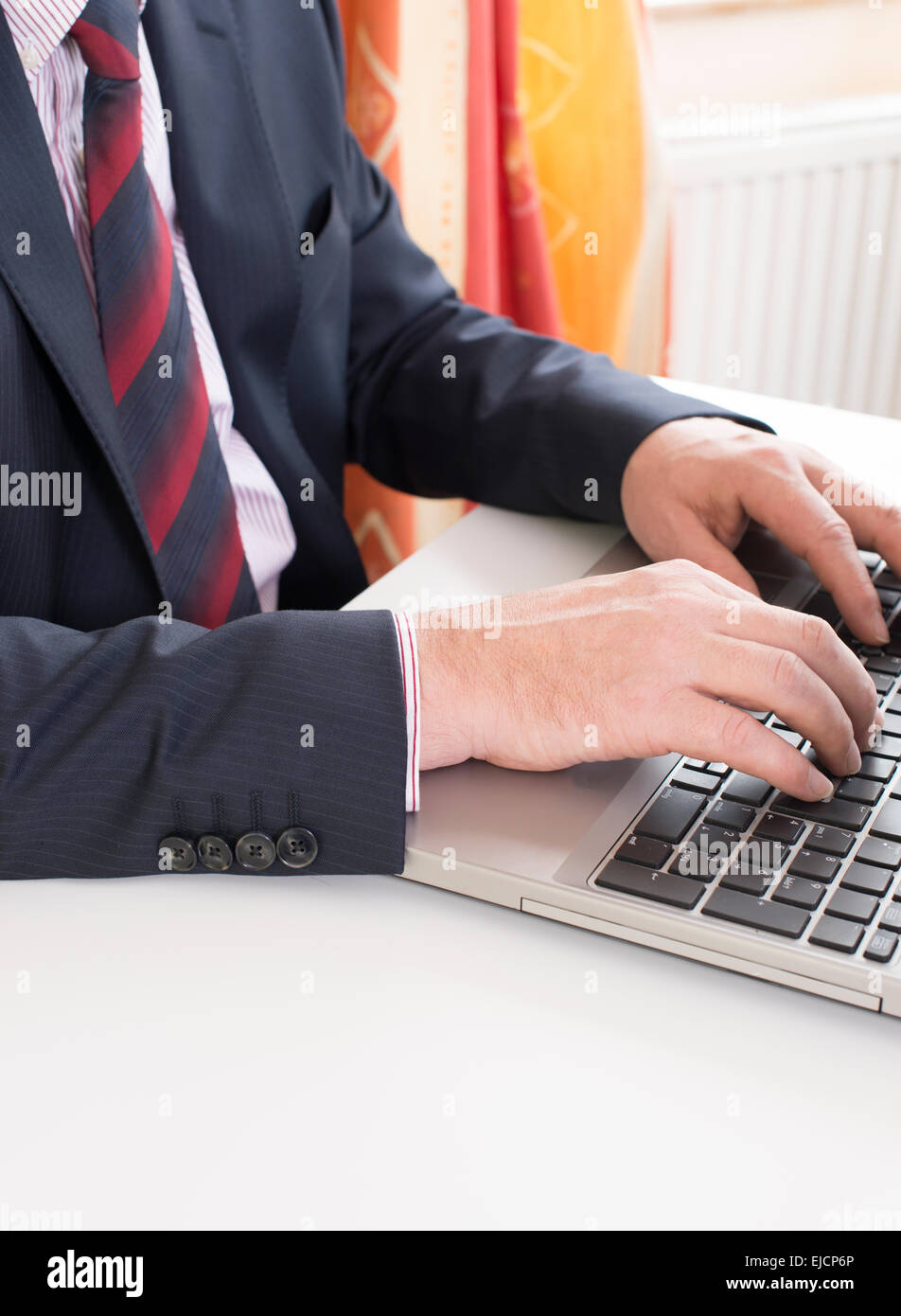 Business man working with laptop Stock Photo - Alamy