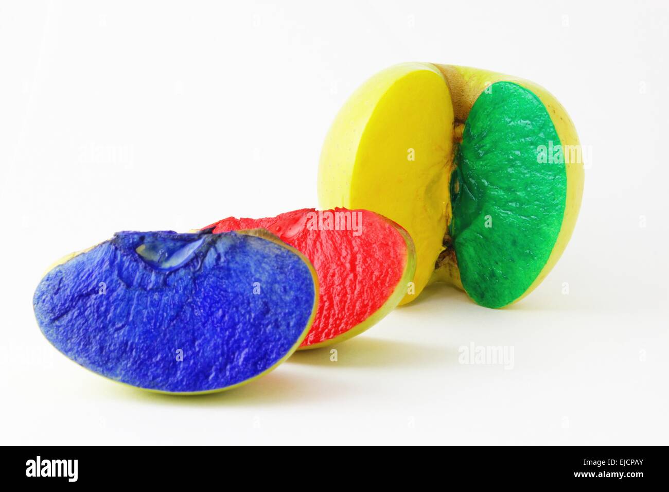 Colored Slices of an Apple Stock Photo - Alamy