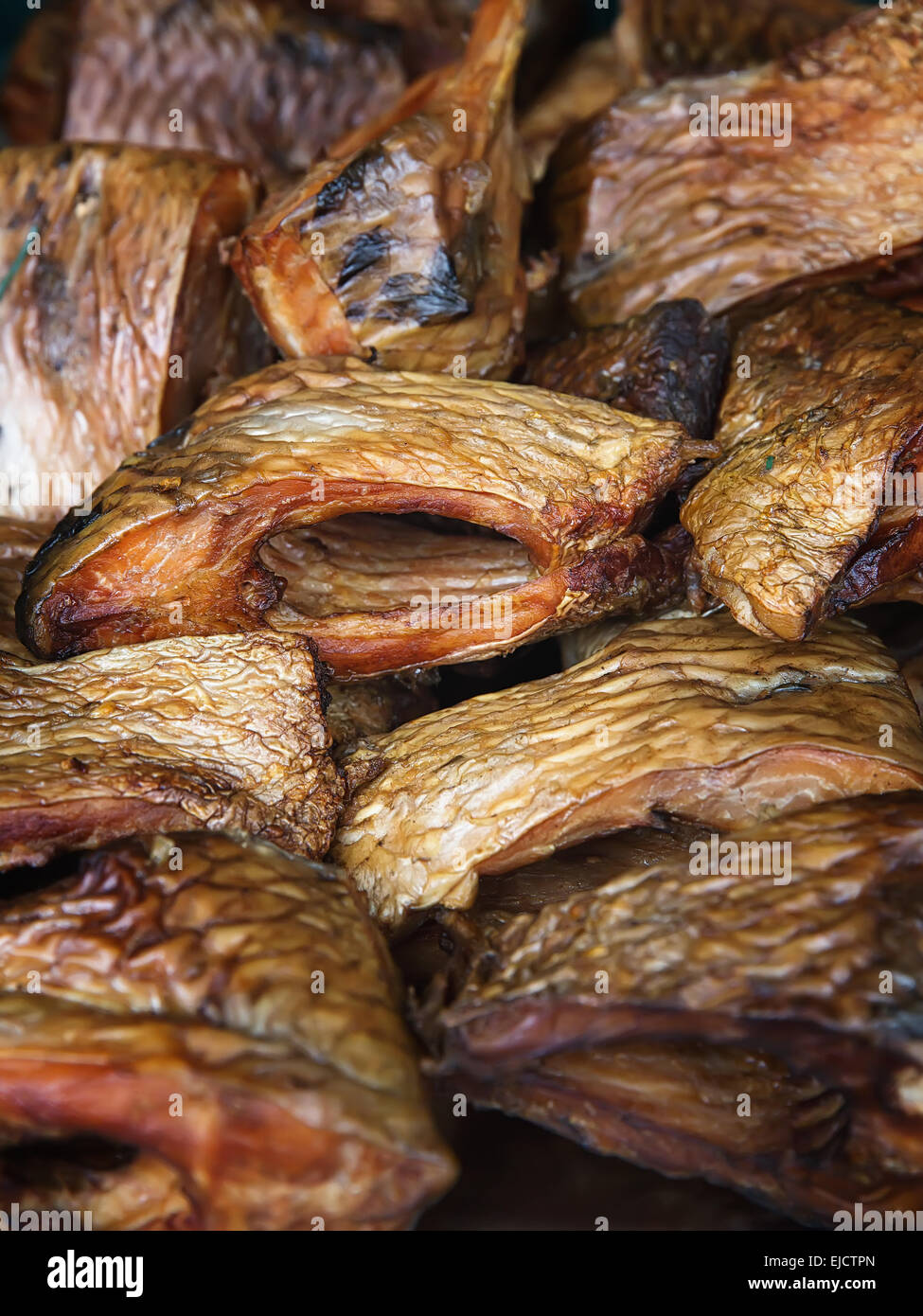 Pieces of smoked carp fish fillets Stock Photo - Alamy