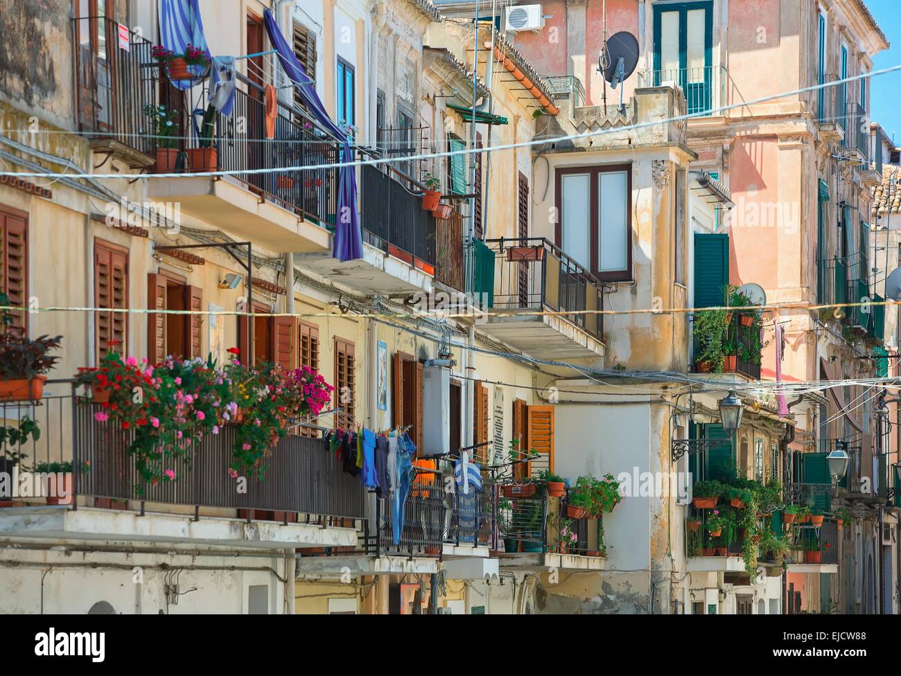 Typical urban balconies in Italy Stock Photo - Alamy