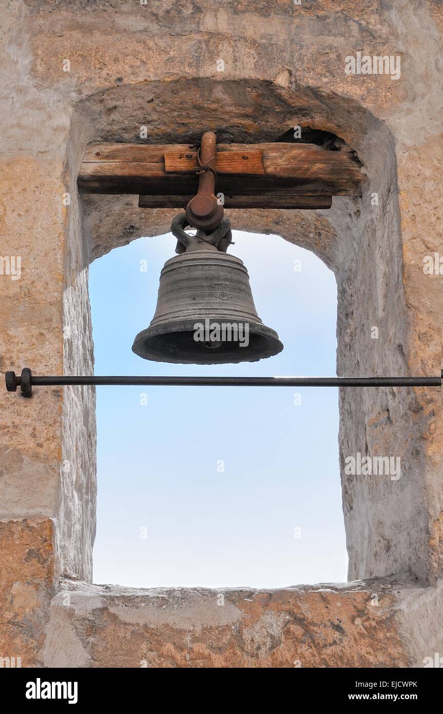 Bell in the window niche Stock Photo - Alamy
