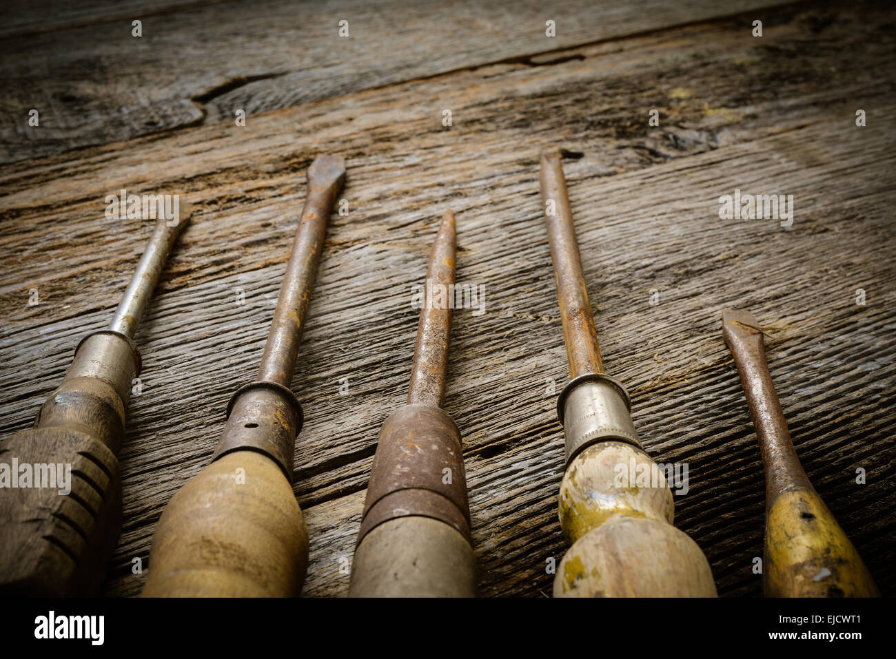 Rustic Screwdrivers on Wood Background Stock Photo - Alamy