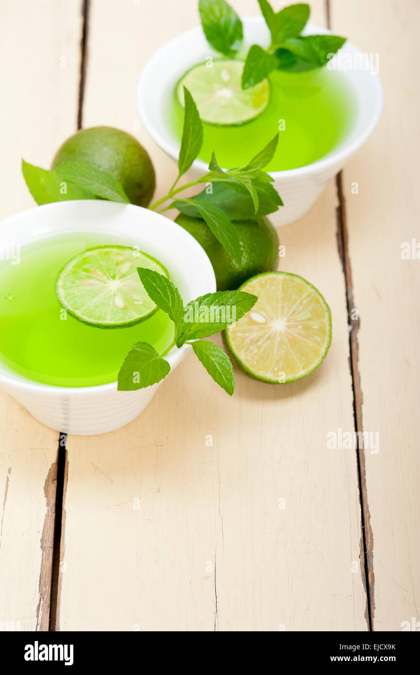 mint infusion tea tisane with lime Stock Photo - Alamy