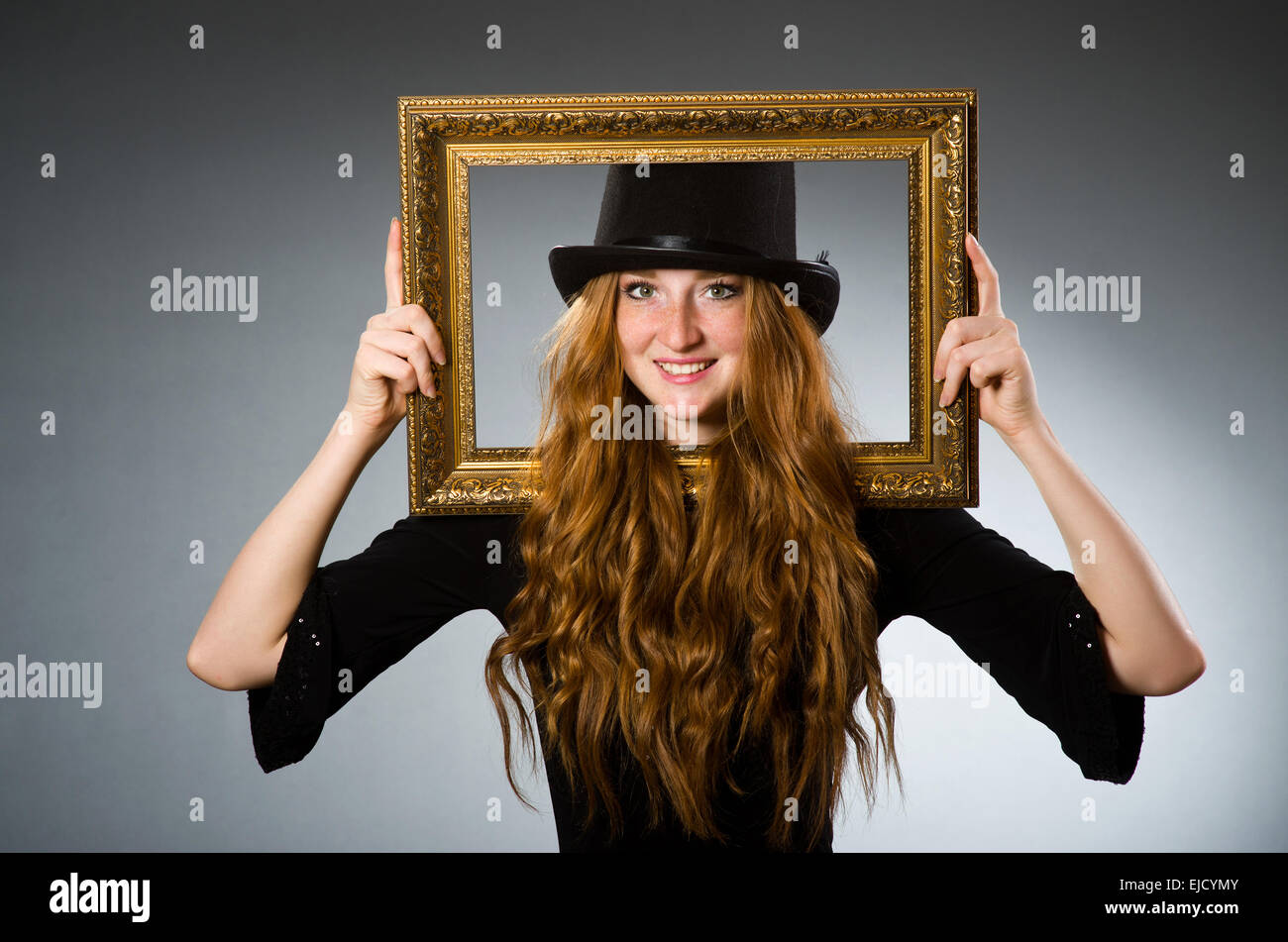 Woman with vintage hat and picture frame Stock Photo - Alamy