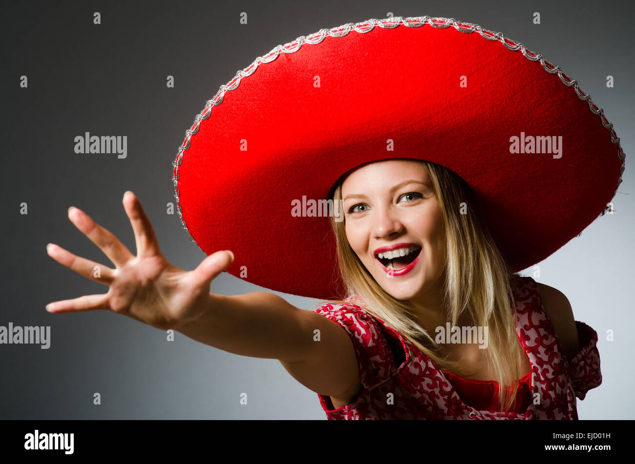 Woman wearing nice red sombrero Stock Photo - Alamy