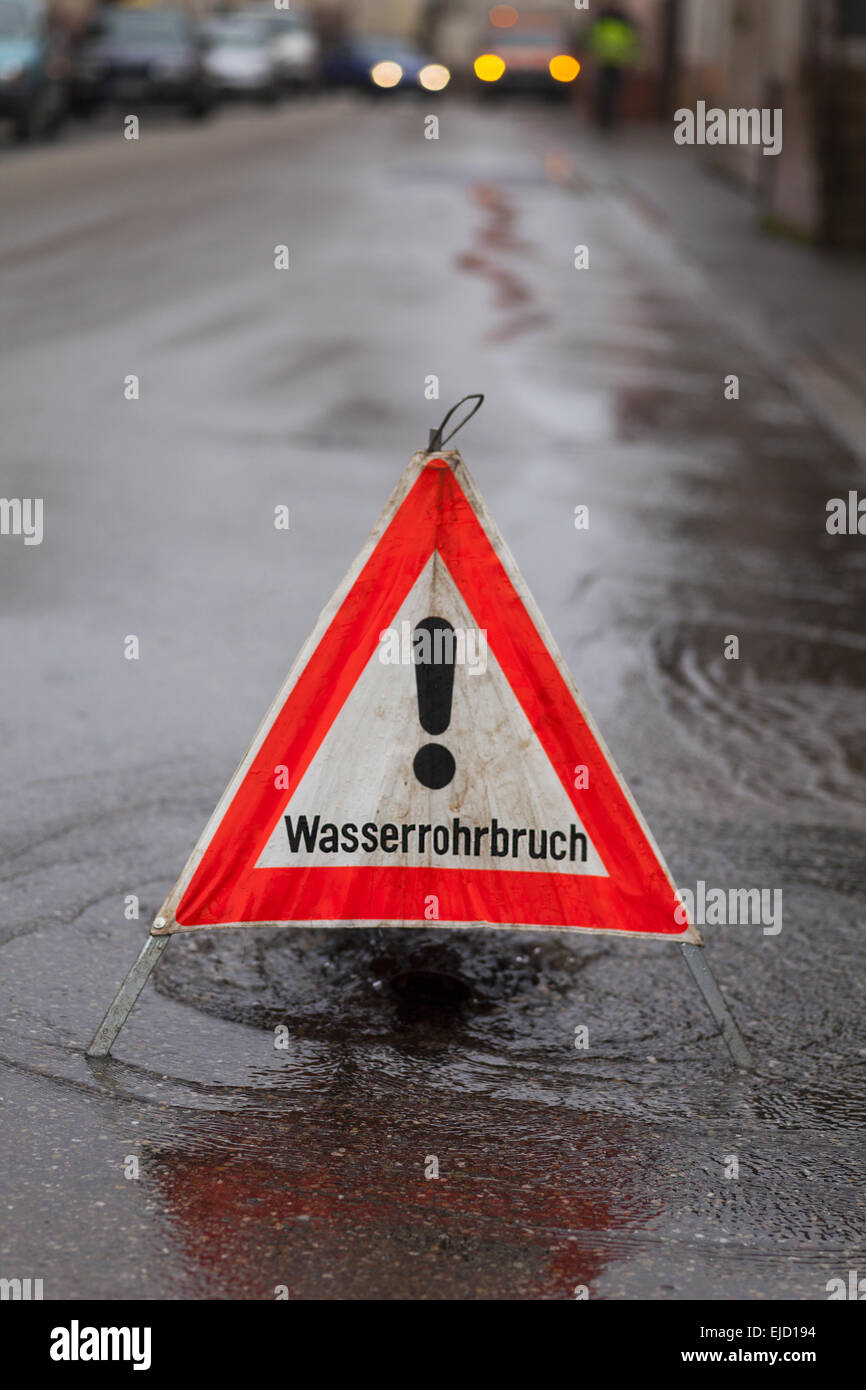 Burst water pipe Stock Photo - Alamy