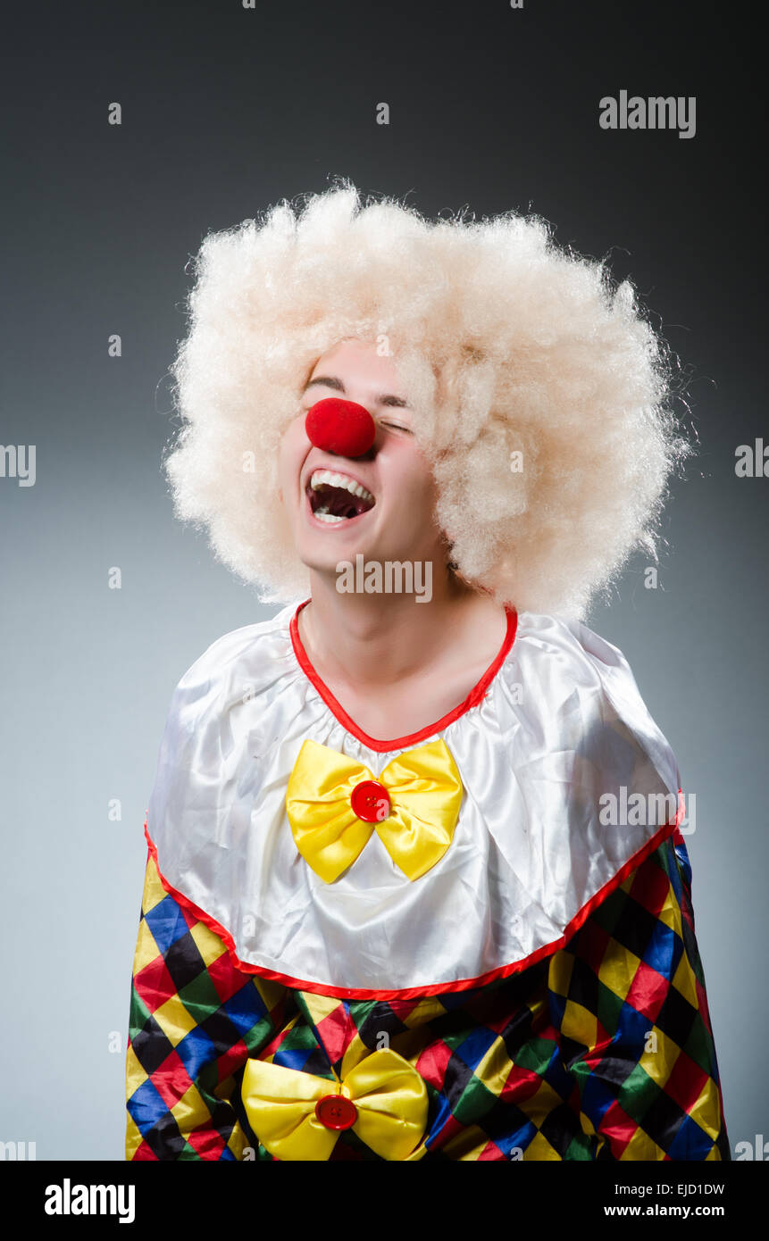 Funny clown in the studio Stock Photo - Alamy