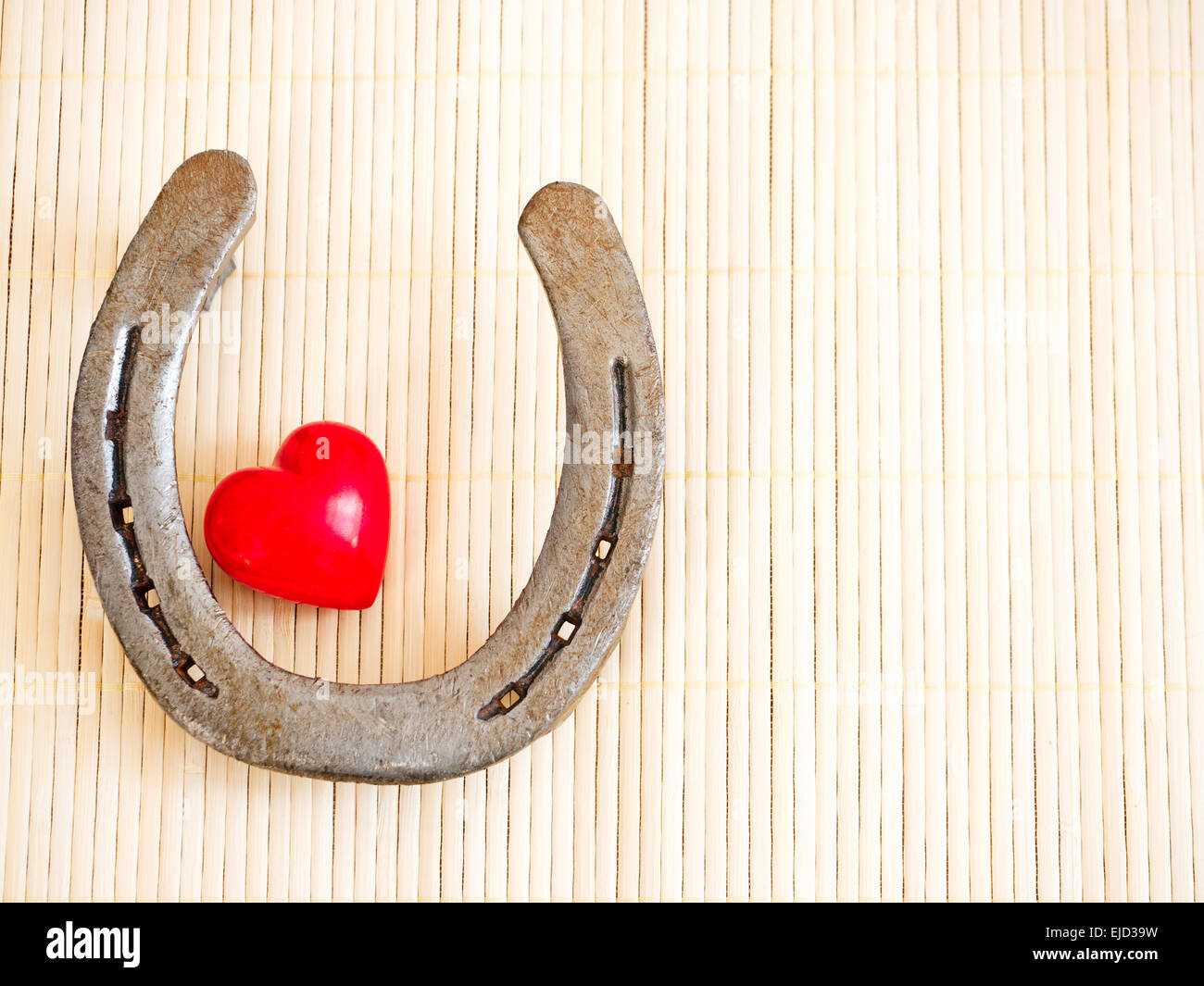 Horseshoe and heart Stock Photo - Alamy