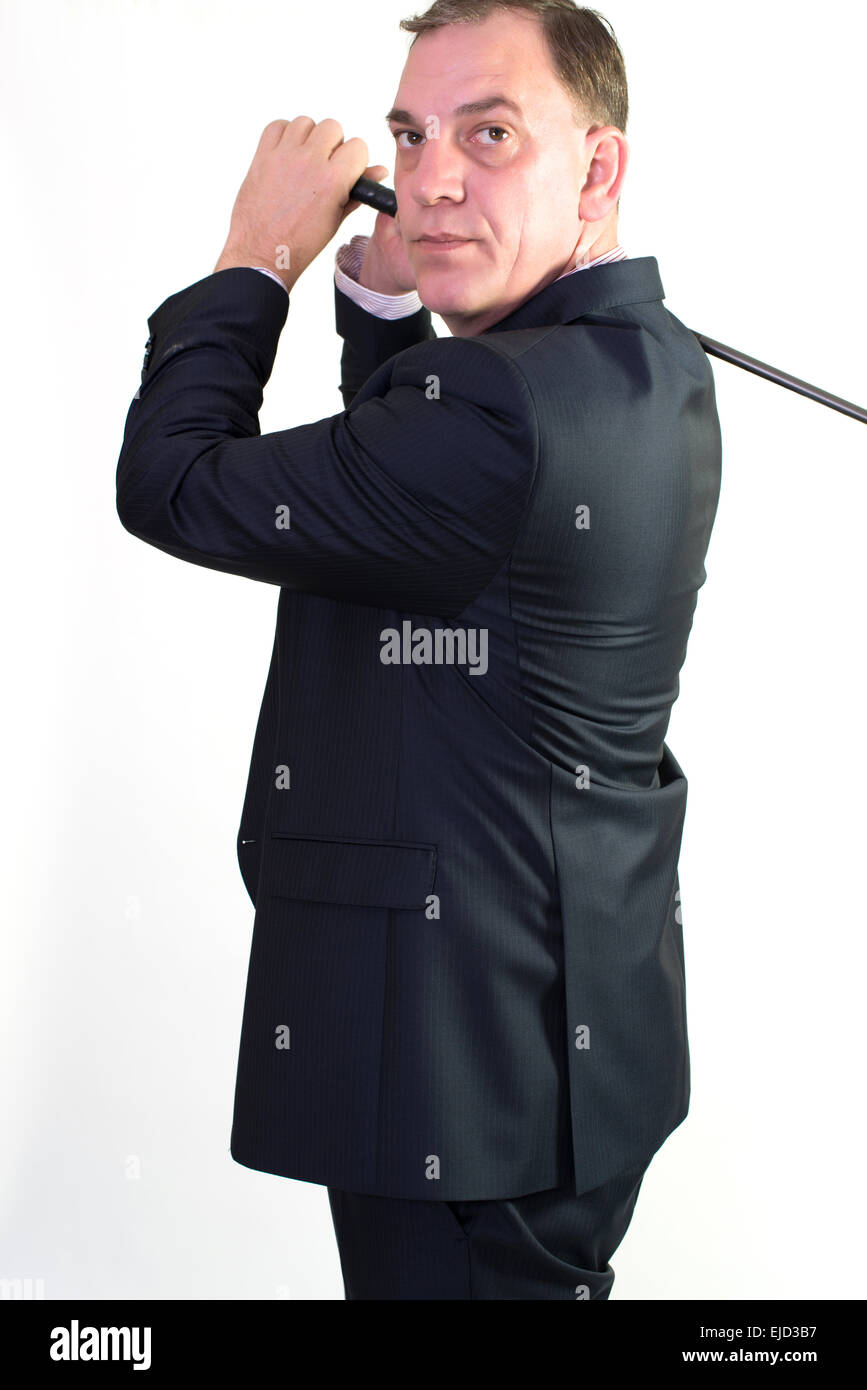Business man playing golf Stock Photo - Alamy