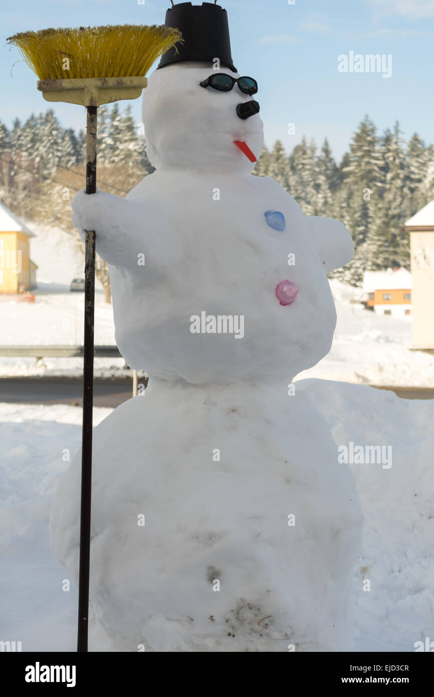 large snowman shows off in winter landscape Stock Photo - Alamy